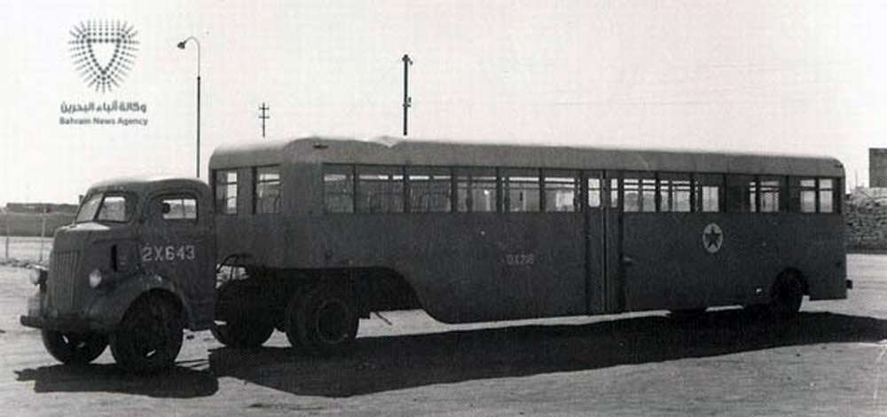 Bapco company workers shuttle bus. | Bahrain News Agency