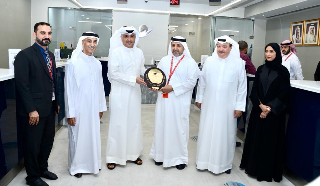 Hanging of shields at Bahrain Post service centres that received Gold ...