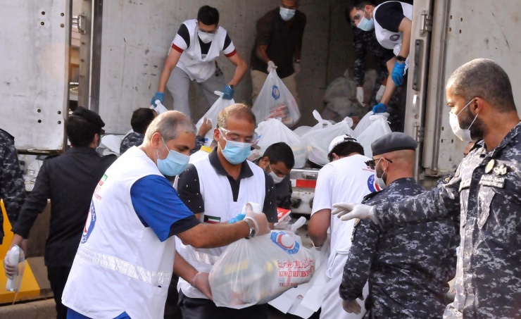 Kuwait Red Crescent Society delivers food to people under lockdown