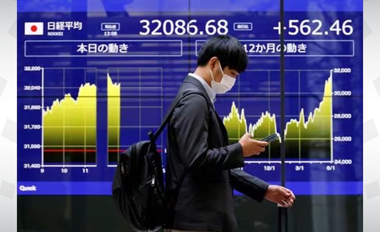 Asian stocks surge on tech rally, markets weigh US rate path