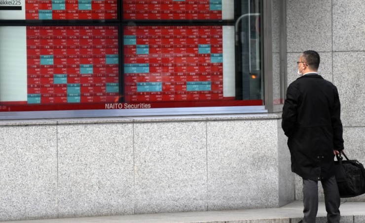 Asian shares mostly rise after Wall Street’s record rally