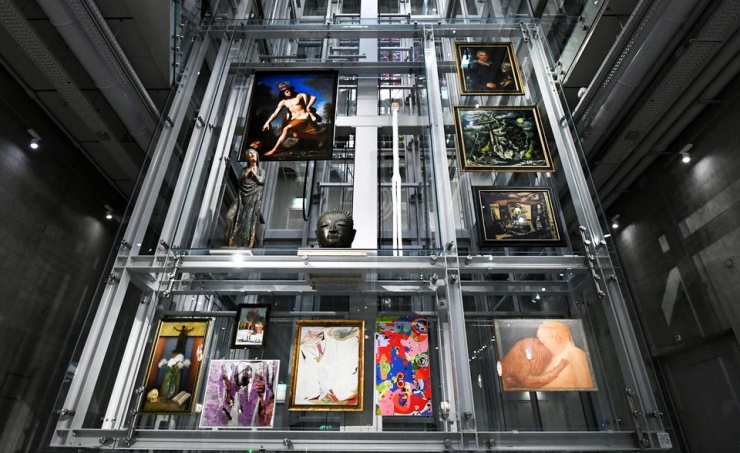Dutch museum unveils once-hidden art collection in new mirrored warehouse