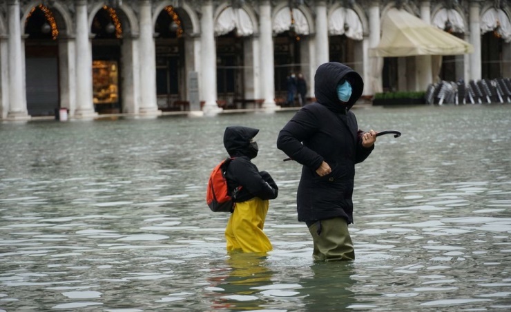 Venice's flood defence system activated as city fights high water
