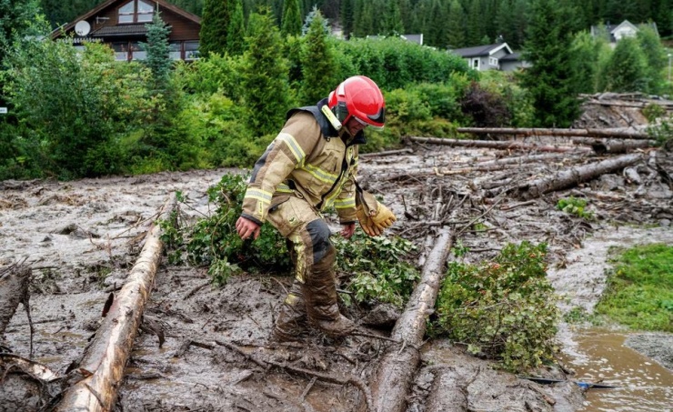 Norwegian river dam partly collapses after floods