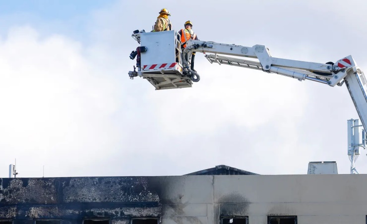 New Zealand police to start removing bodies after hostel fire